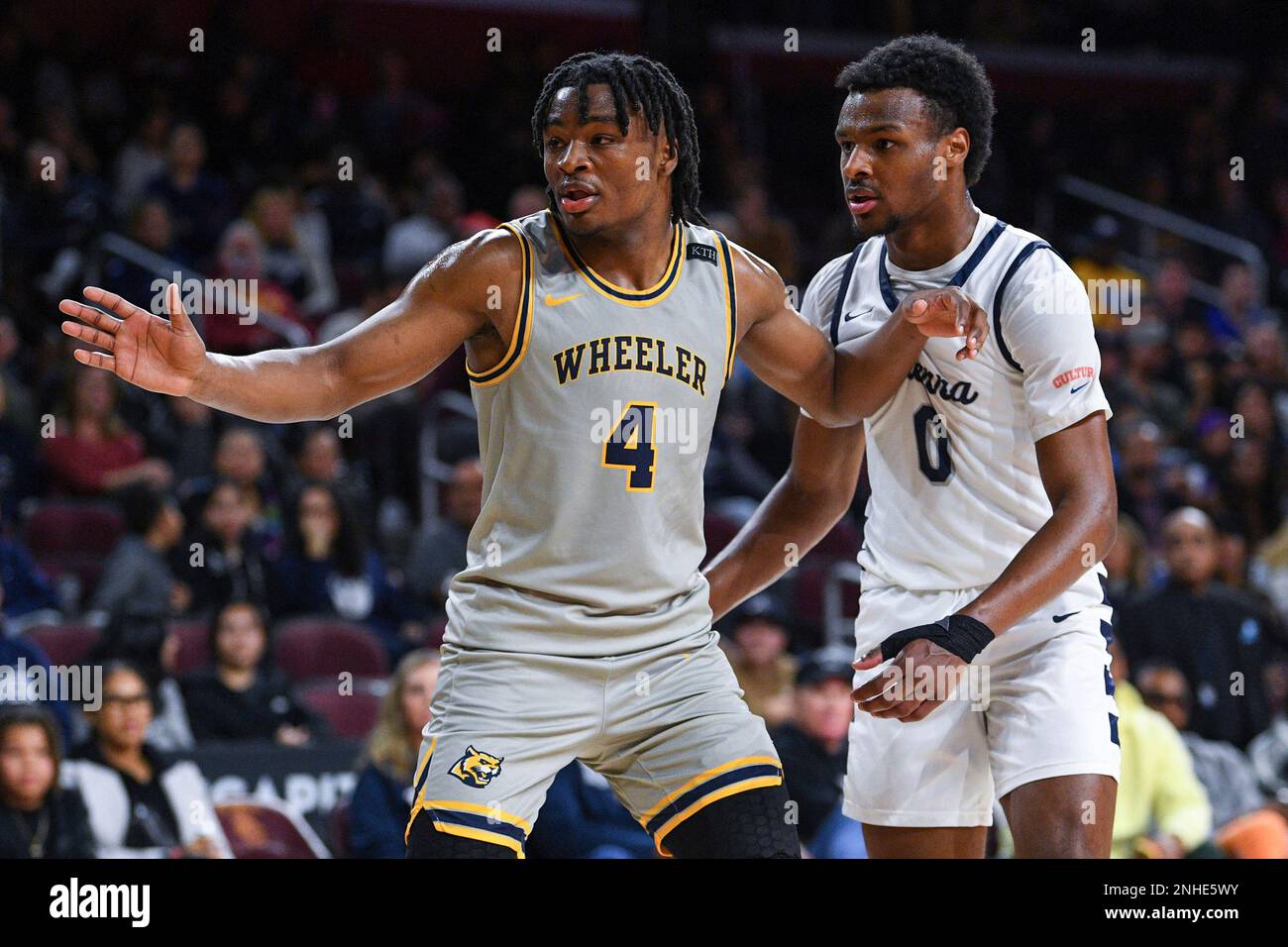 LOS ANGELES, CA - JANUARY 07: Wheeler guard Isaiah Collier guarded by ...