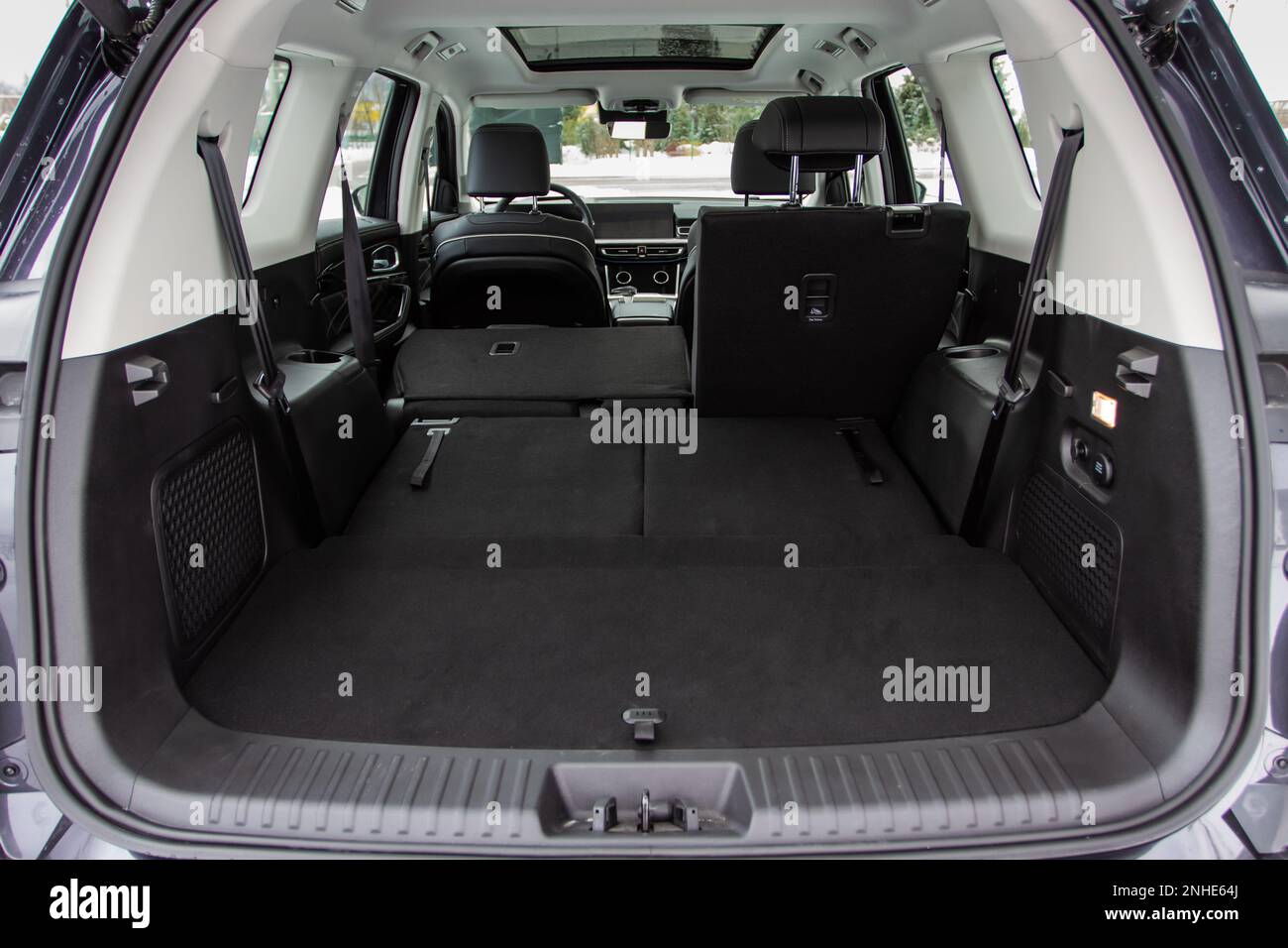 Huge, clean and empty car trunk in interior of compact suv. Rear view ...