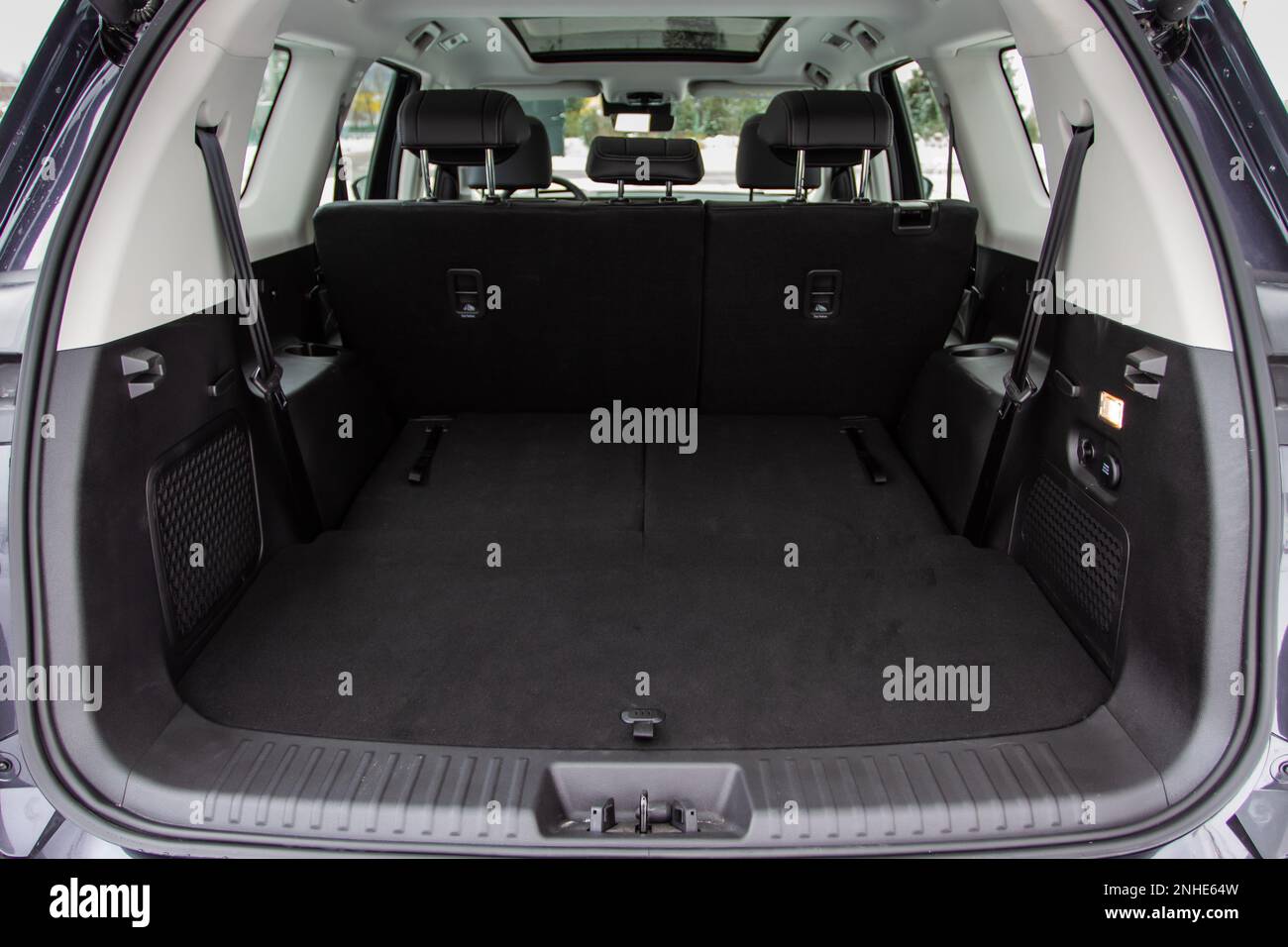 Huge, clean and empty car trunk in interior of compact suv. Rear view ...