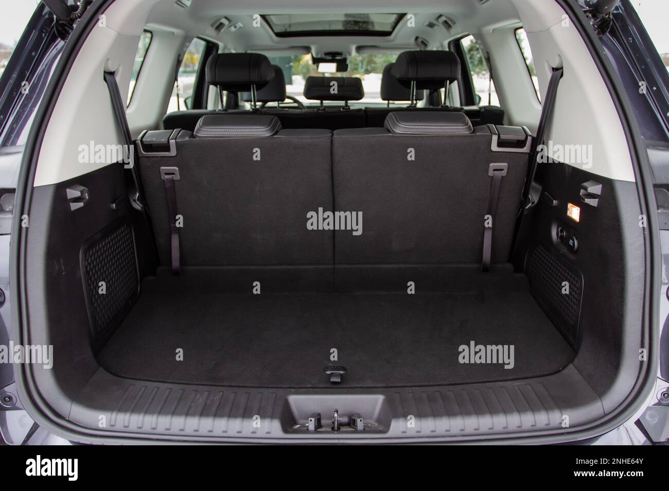 Huge, clean and empty car trunk in interior of compact suv. Rear view ...