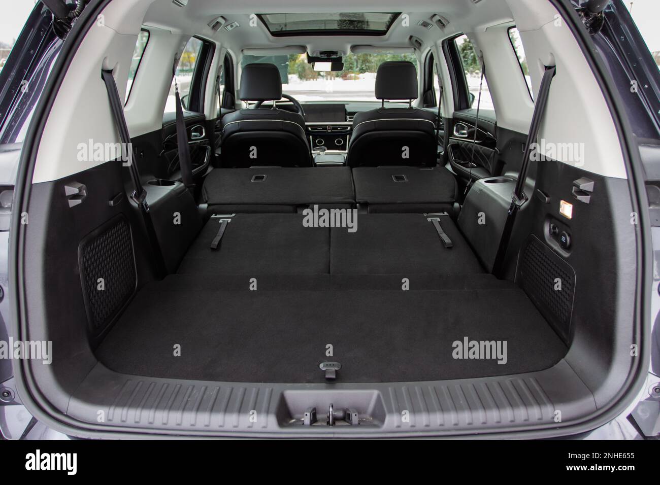 Huge, clean and empty car trunk in interior of compact suv. Rear view ...