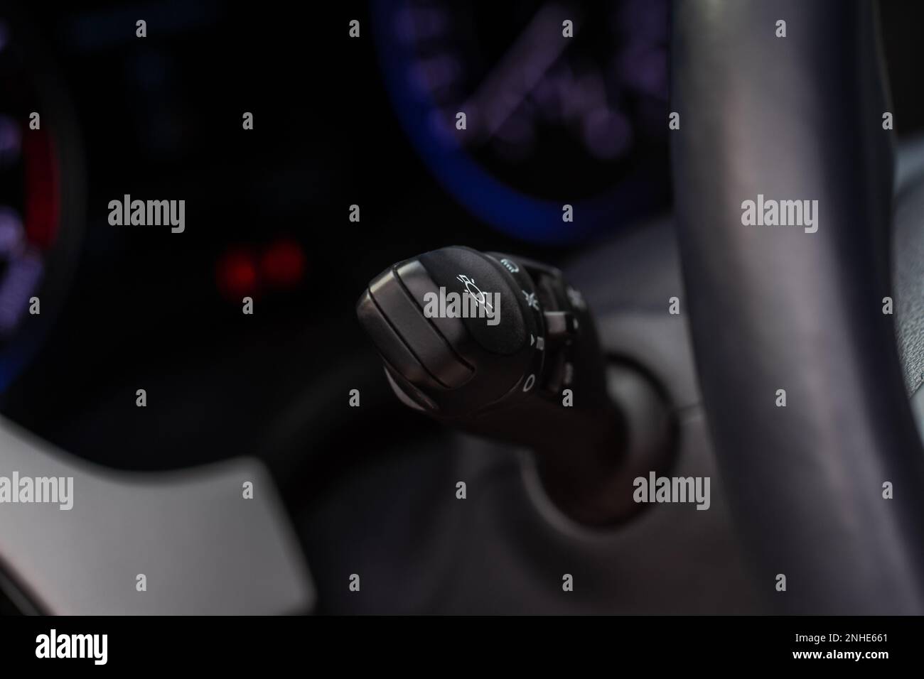 Modern car light switch. Turning on headlight in the car. Close up of ...