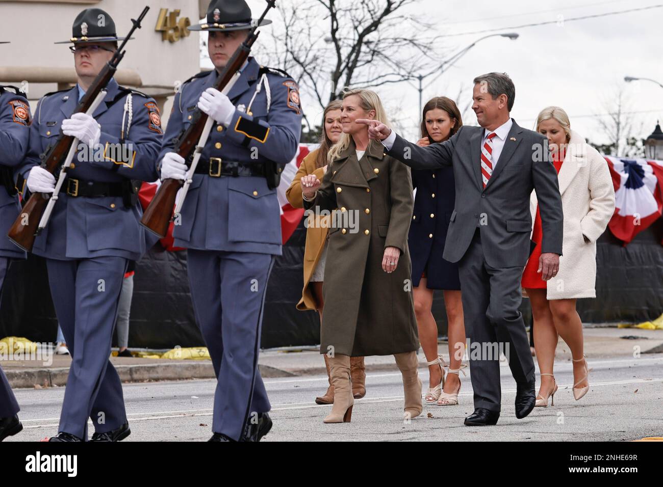 Georgia Gov. Brian Kemp and his family walk to the Georgia State ...