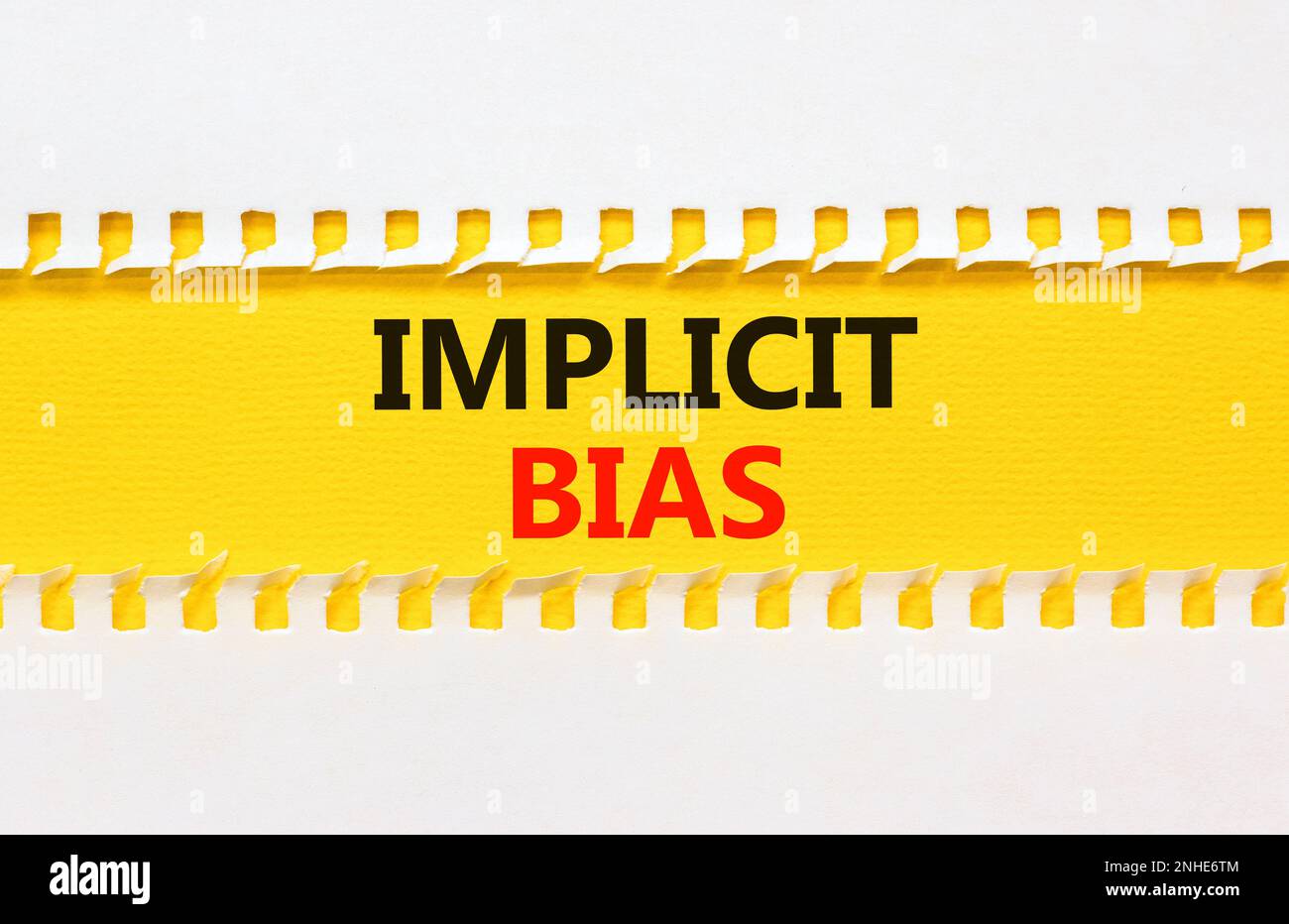 Implicit bias symbol. Concept words Implicit bias on yellow paper ...