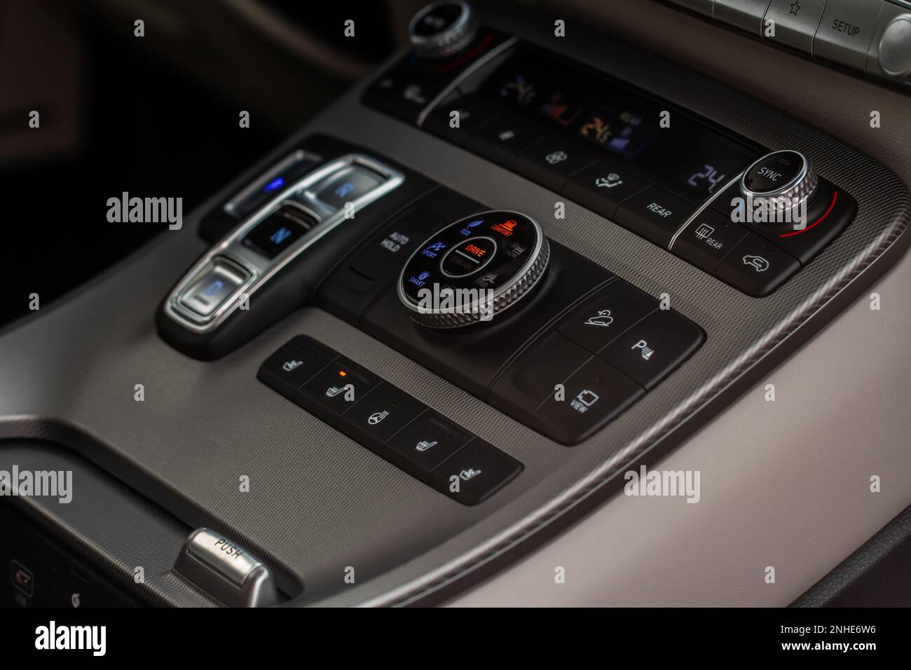 Modern car central console. Drive mode selector button Stock Photo - Alamy