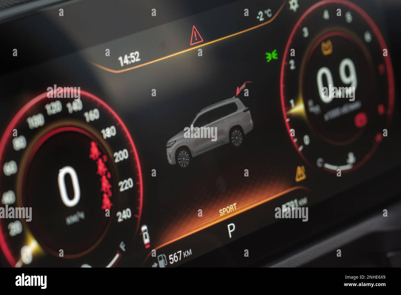 Opened trunk warning. Modern car dashboard with speedometer, tachometer ...