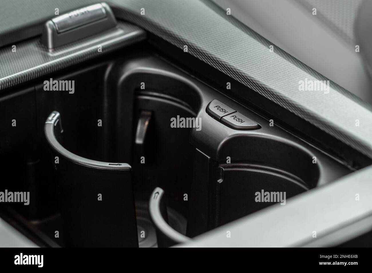 Cup holders inside modern car interior. Interior view of modern car ...