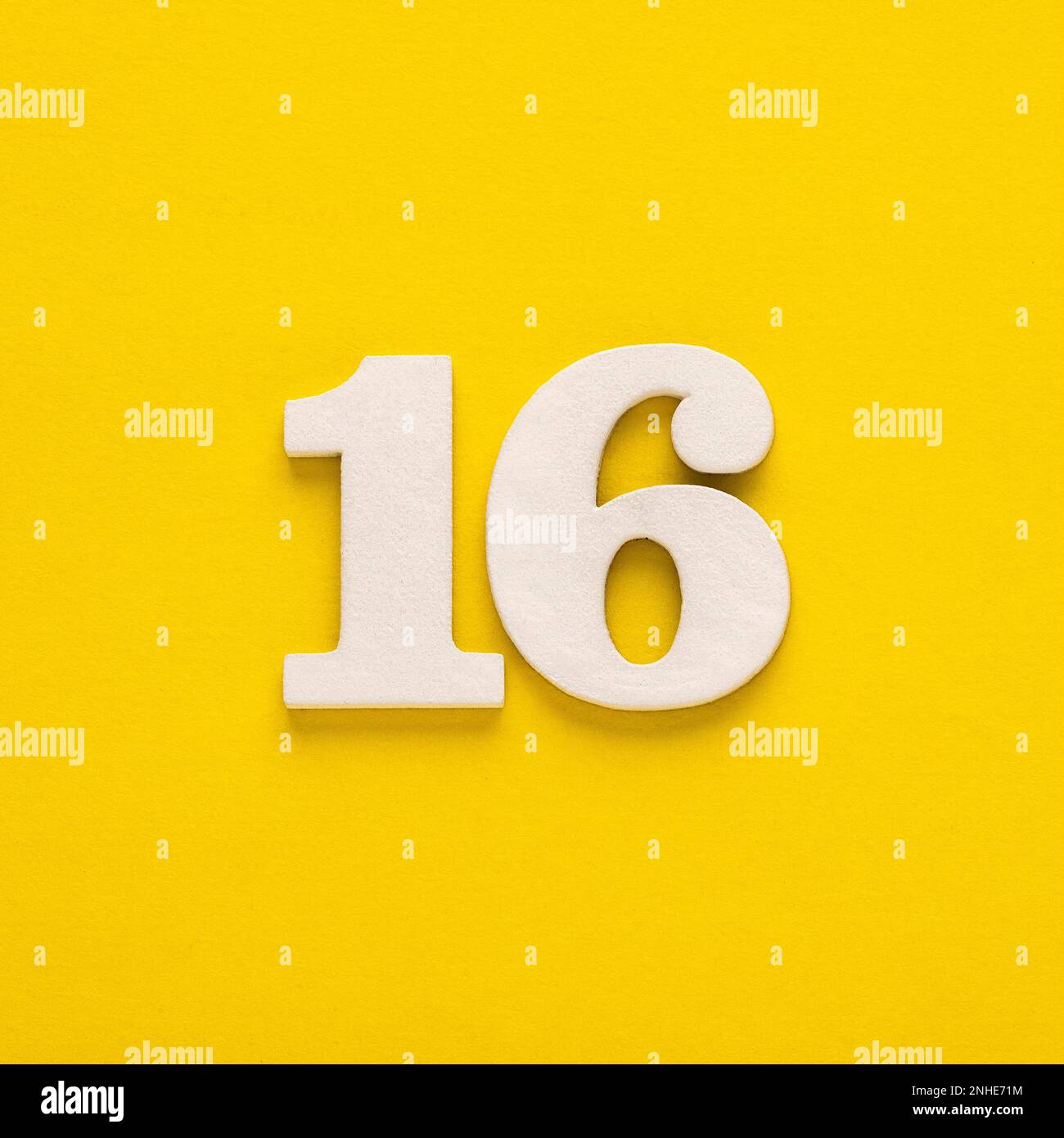 Number 16 on a yellow background - Two-digit number in white Stock ...