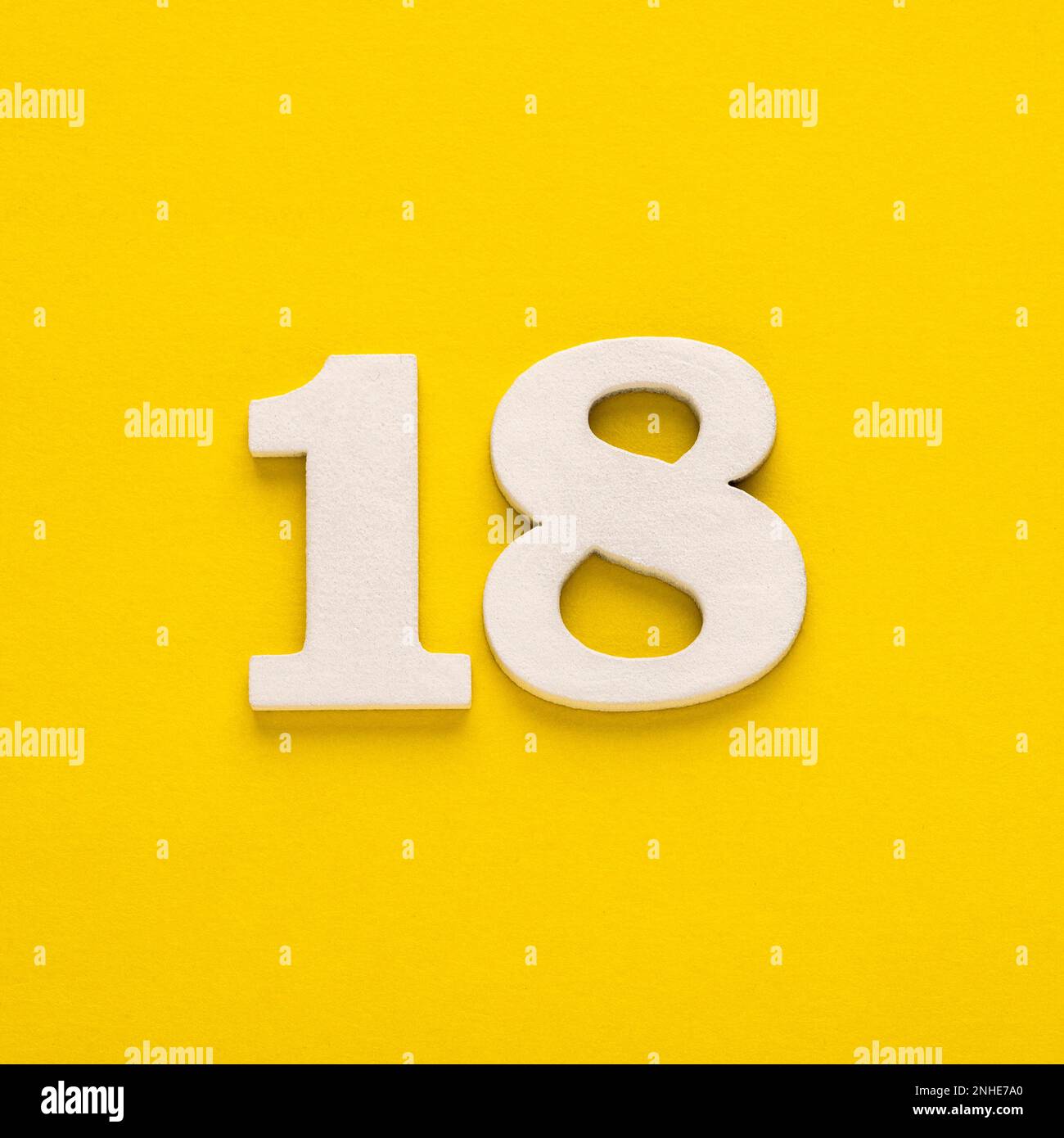 Number 18 on a yellow background - Two-digit number in white Stock ...