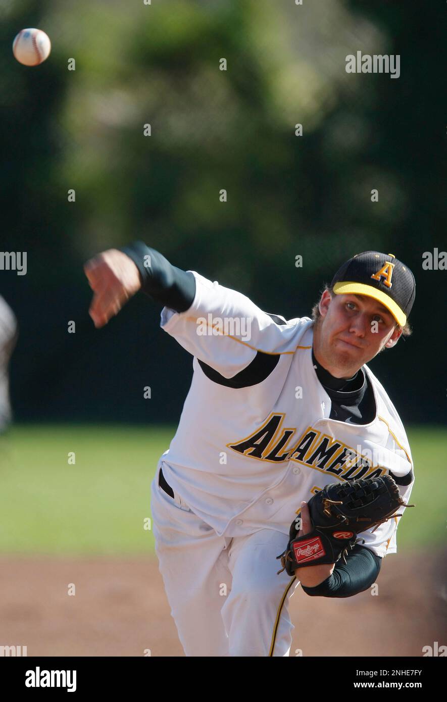 Alameda High's starting pitcher Jason Miller throws against Berkeley ...