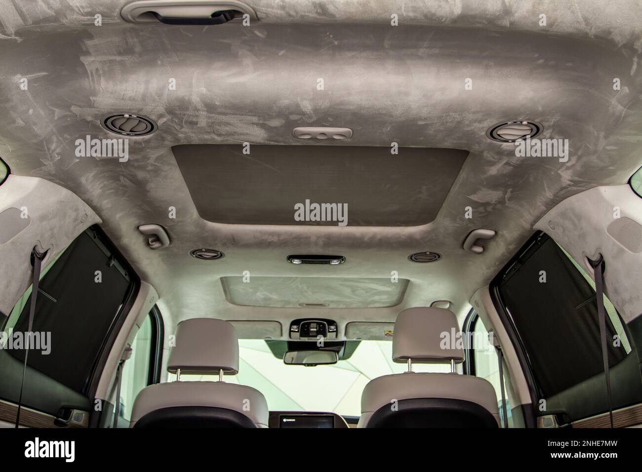 Modern car closed sunroof Stock Photo - Alamy