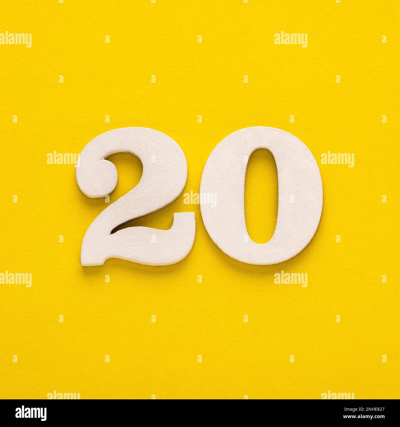 Number 20 on a yellow background - Two-digit number in white Stock ...