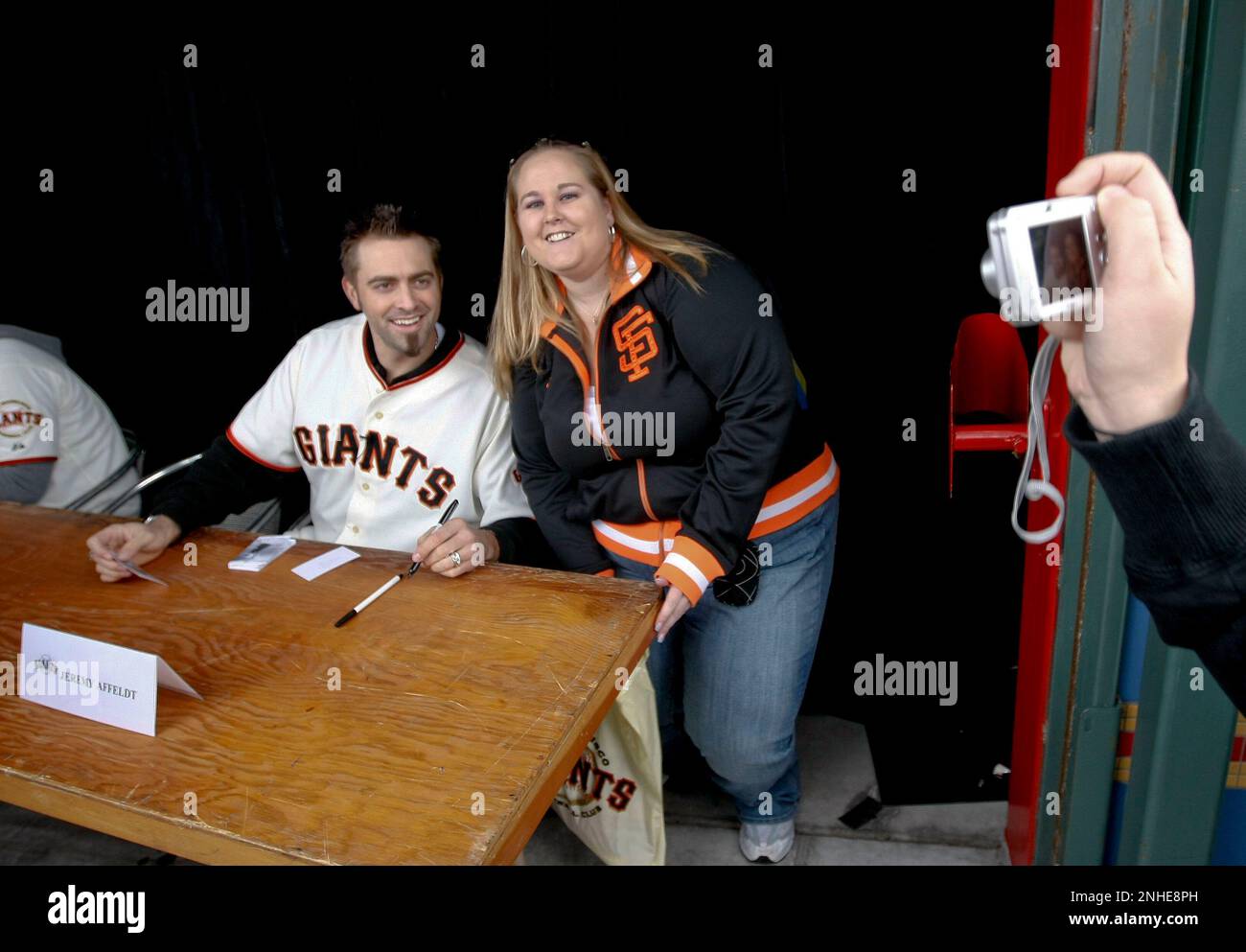 Giant's Jeremy Affeldt takes a photo with fan, Michele Jensen of ...
