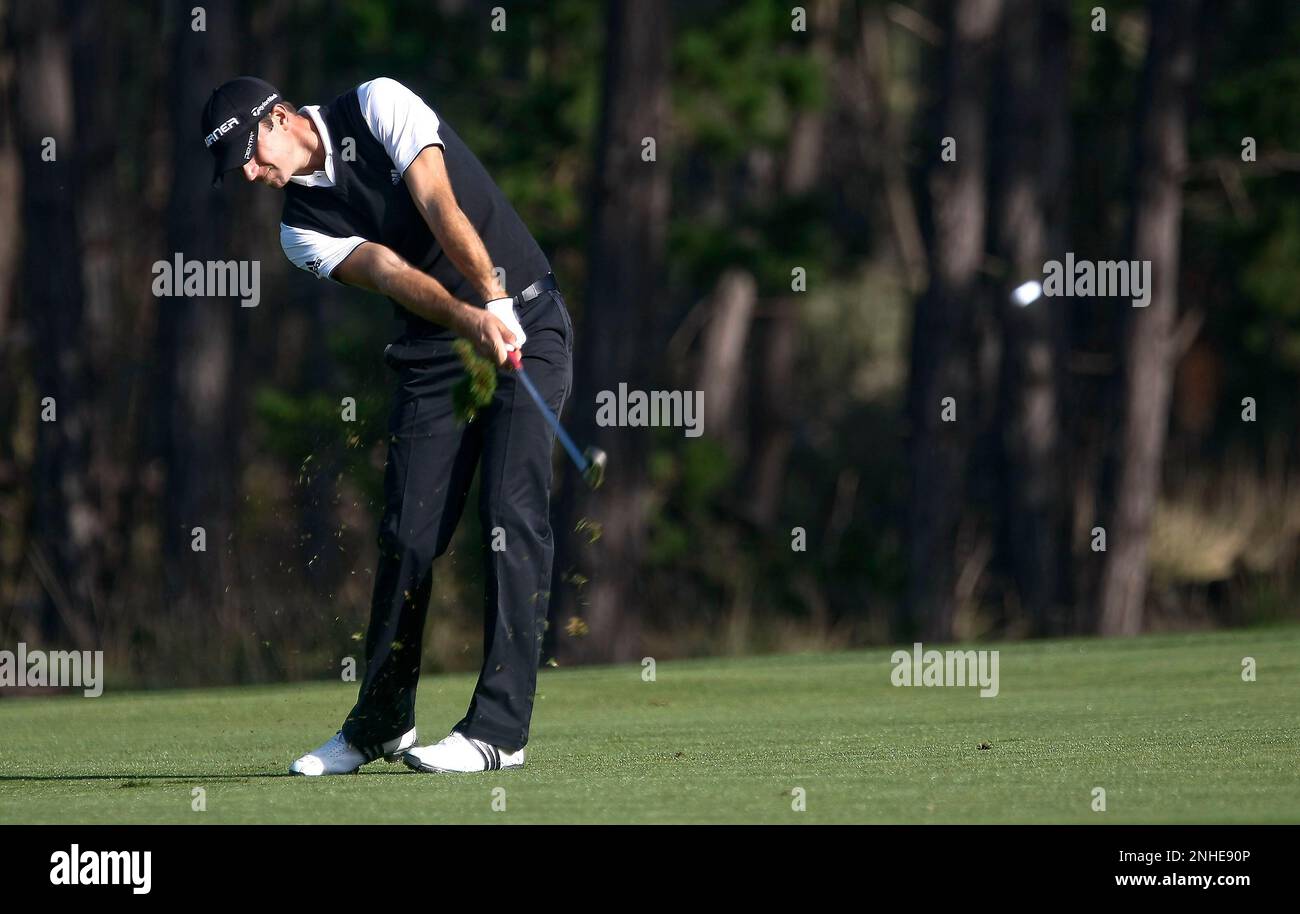 Dustin Johnson hits an iron to the 6th hole at Spyglass Hill during ...