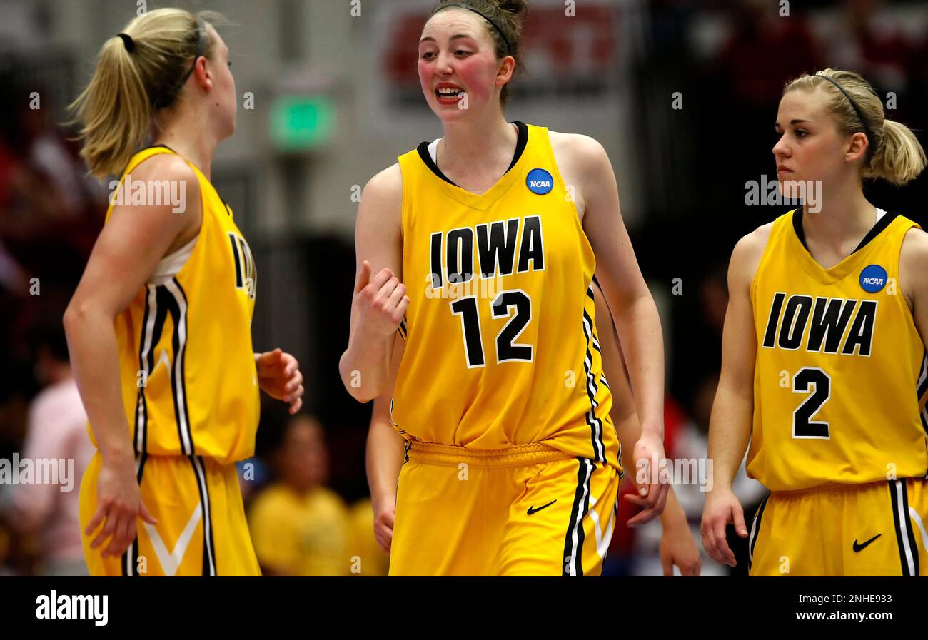 Iowa's Jaime Printy (24), Morgan Johnson (12) and Kamile Wahlin (2 ...