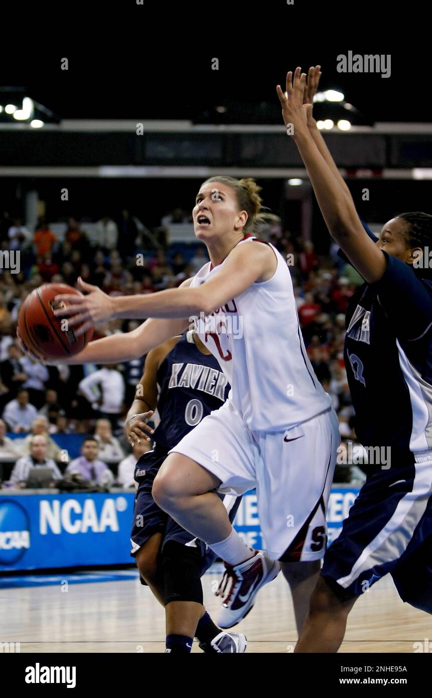Stanford's Jeanette Pohlen drives in for the final basket inside Xavier ...