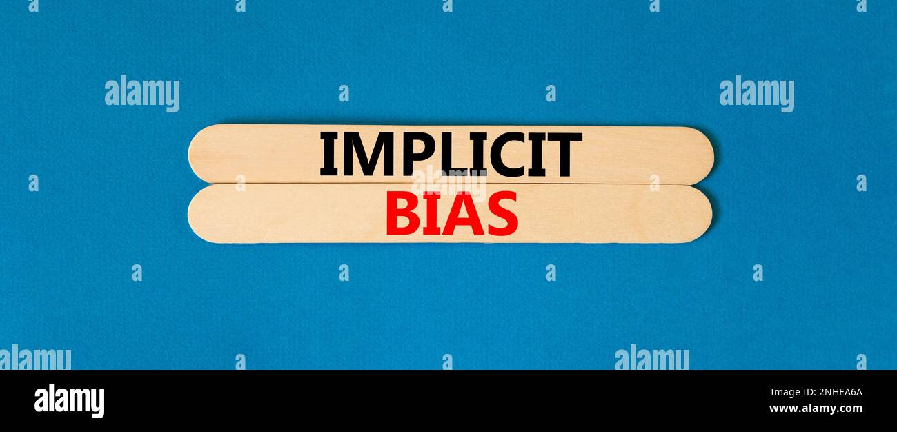 Implicit bias symbol. Concept words Implicit bias on wooden sticks ...