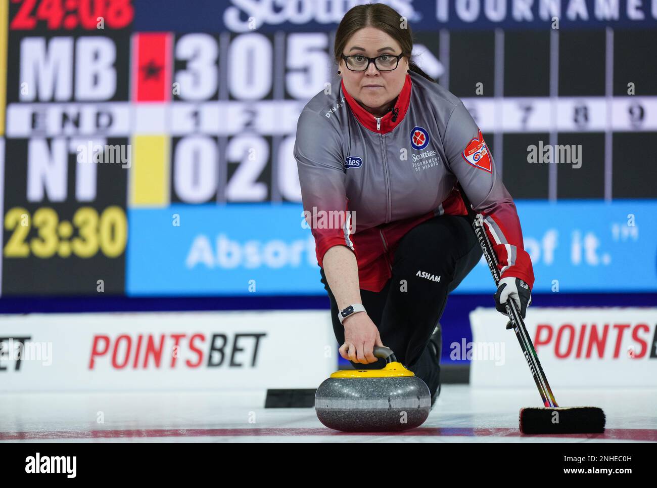 Northwest Territories skip Kerry Galusha delivers a rock while playing ...