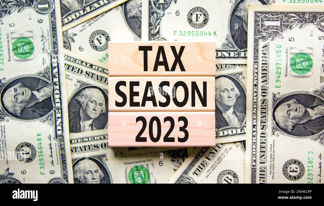Tax season 2023 symbol. Concept words Tax season 2023 on wooden blocks ...