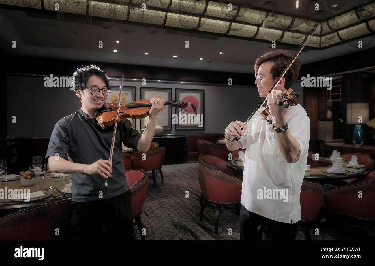 Brett Yang (left) and Eddy Chen who make up TwoSet Violin, 3 November ...