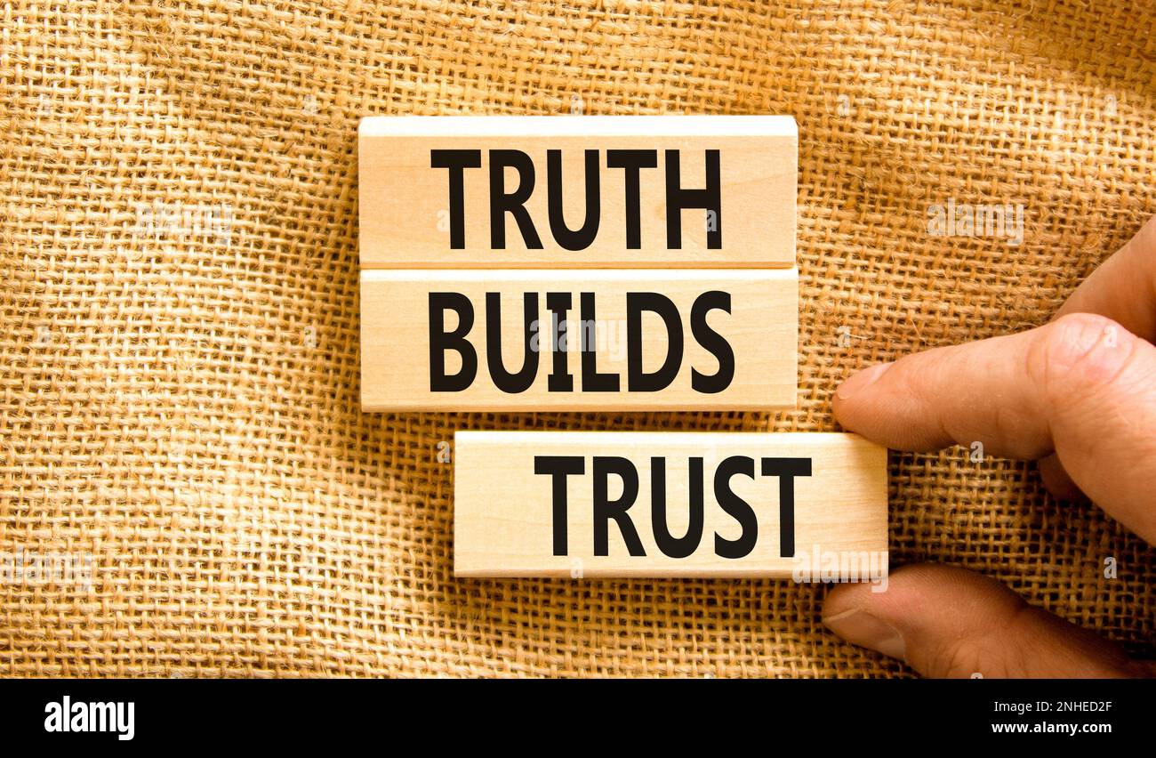 Truth builds trust symbol. Concept words Truth builds trust on wooden ...