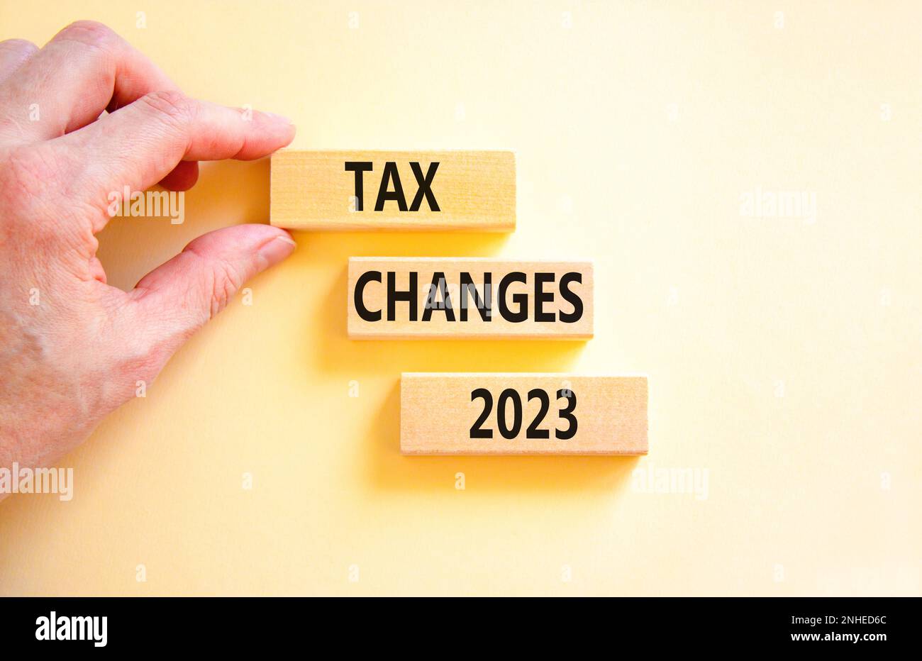 Tax changes 2023 symbol. Concept words Tax changes 2023 on wooden ...