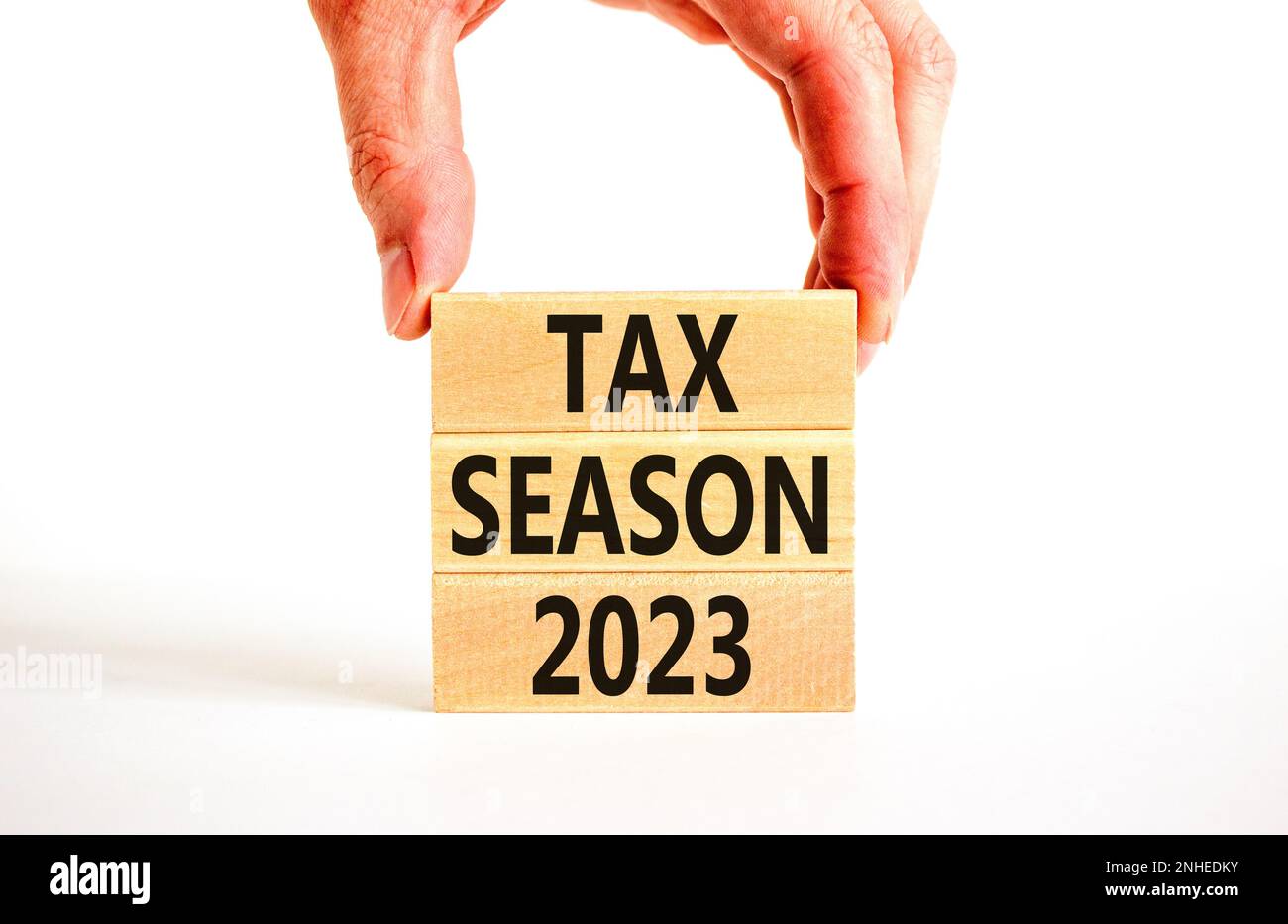 Tax season 2023 symbol. Concept words Tax season 2023 on wooden blocks ...