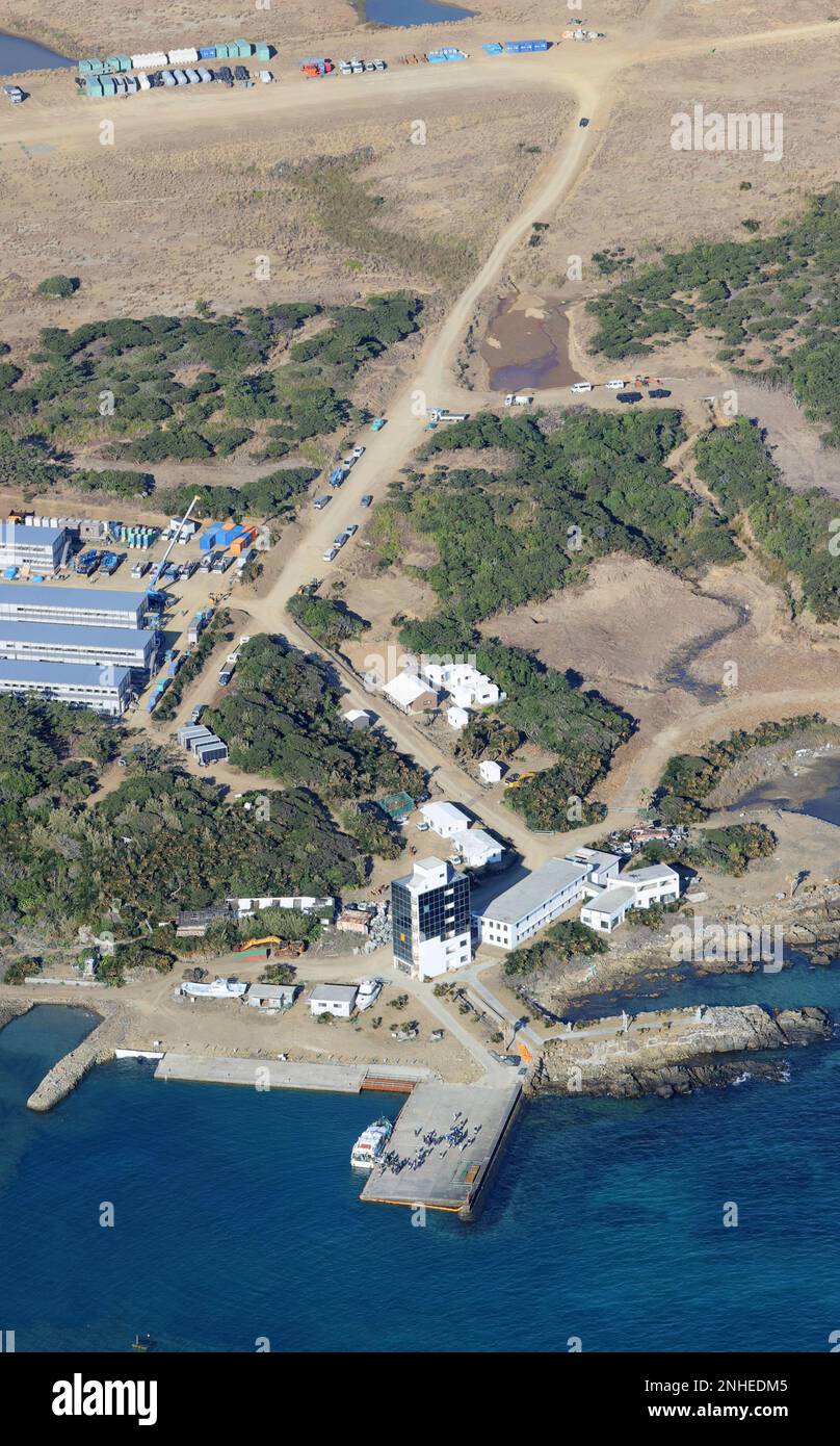 Workers are at Mageshima Island in Iriomote City, Kagoshima Prefecture ...