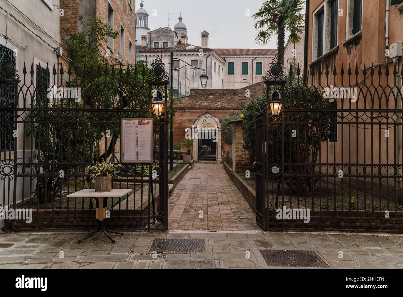 Entrance of a charming Italian restaurant Stock Photo - Alamy