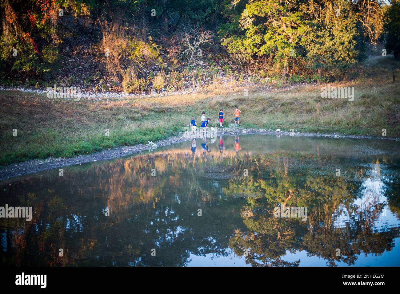 kids by lake Stock Photo - Alamy
