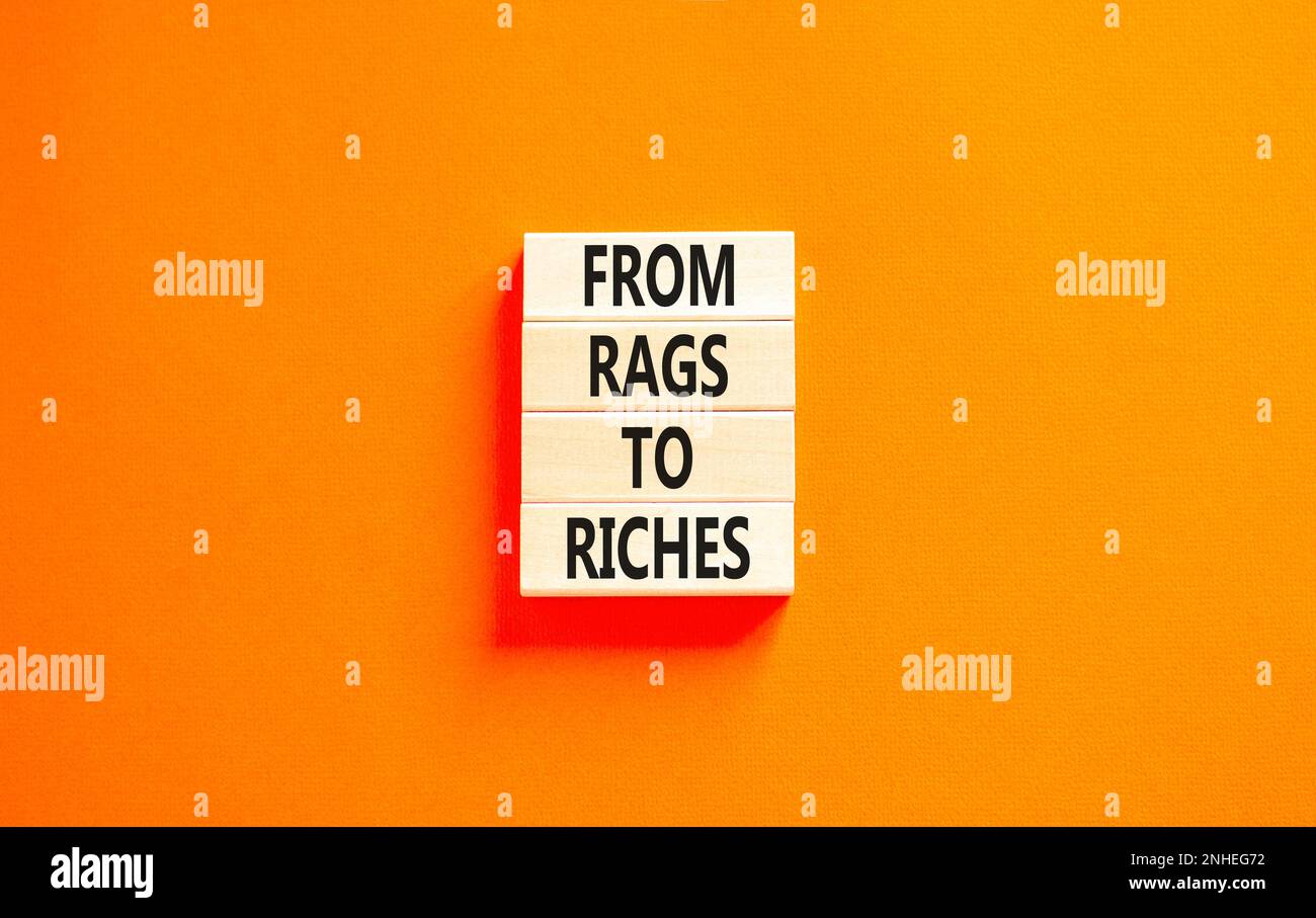 Rags or riches symbol. Concept words From rags to riches on wooden ...