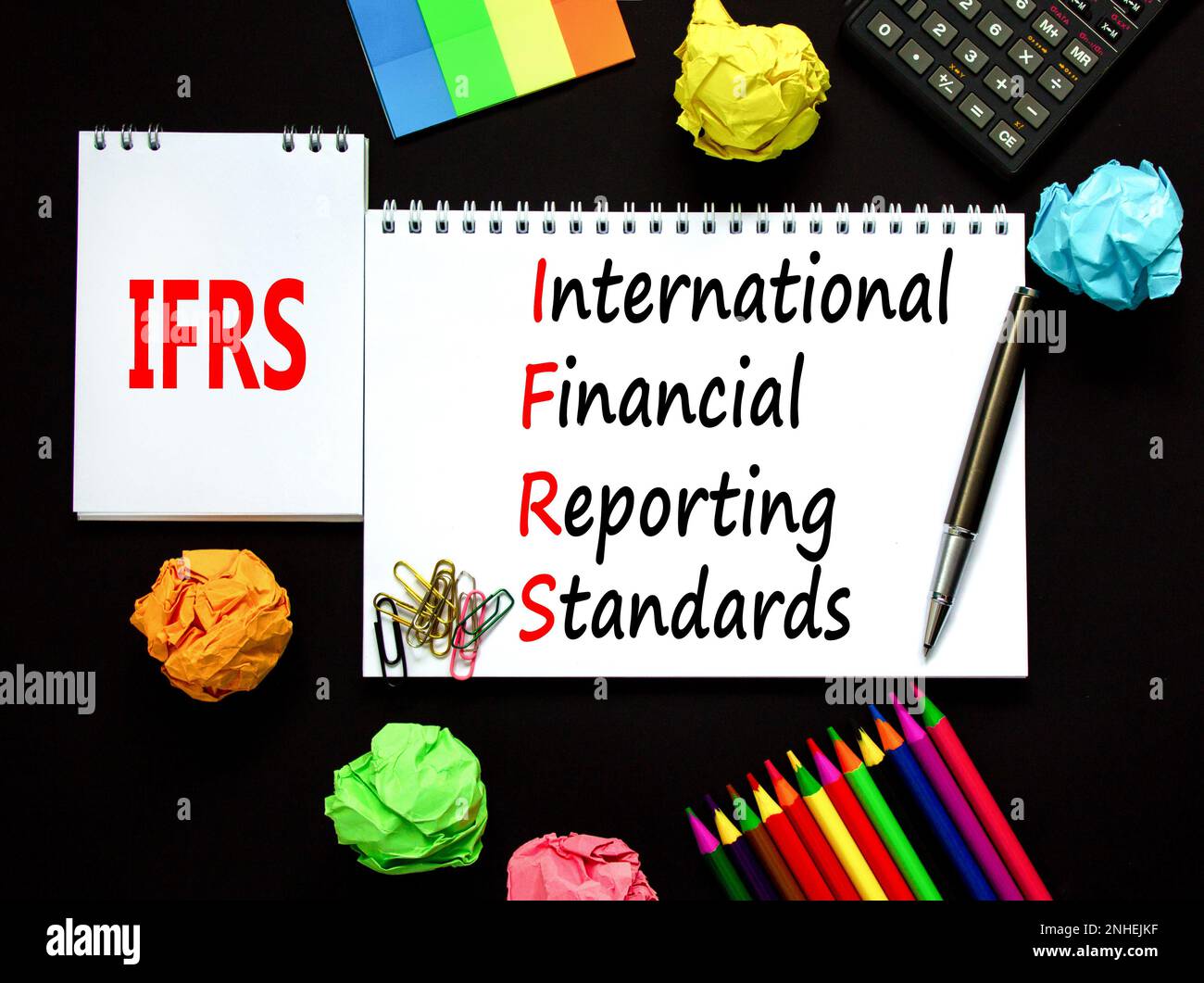 IFRS symbol. Concept words IFRS international financial reporting standards on white note on ...