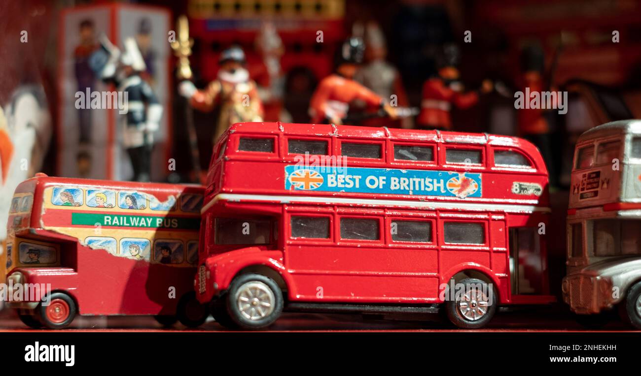 Model of vintage red double decker London bus with slogan 'Best of ...