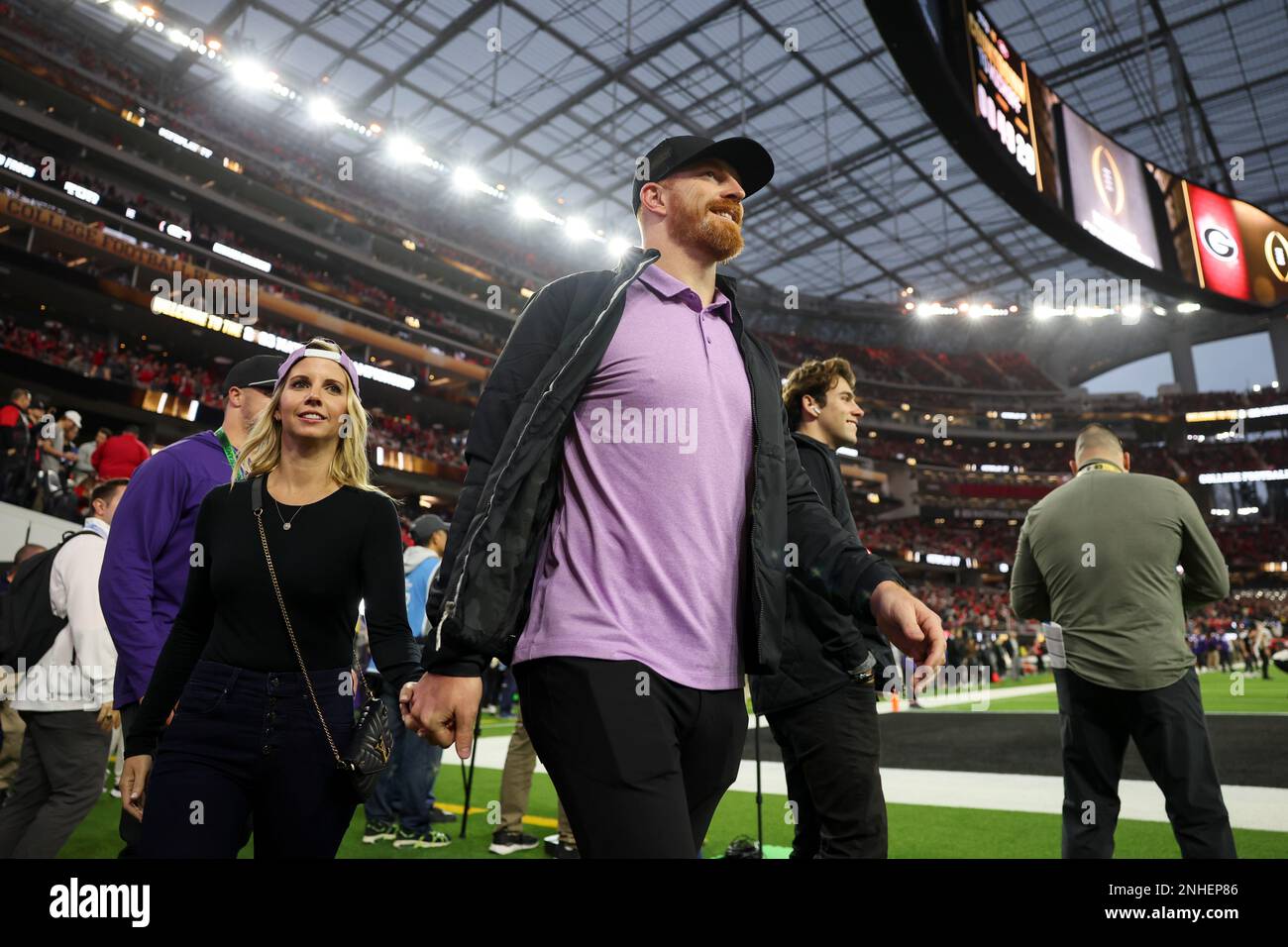 NFL quarterback and TCU alum Andy Dalton walks on the field with his ...