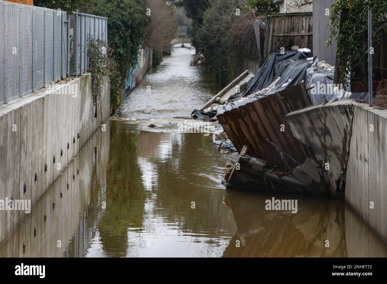 A damaged flood control wall along Crosby Street in the Washington ...
