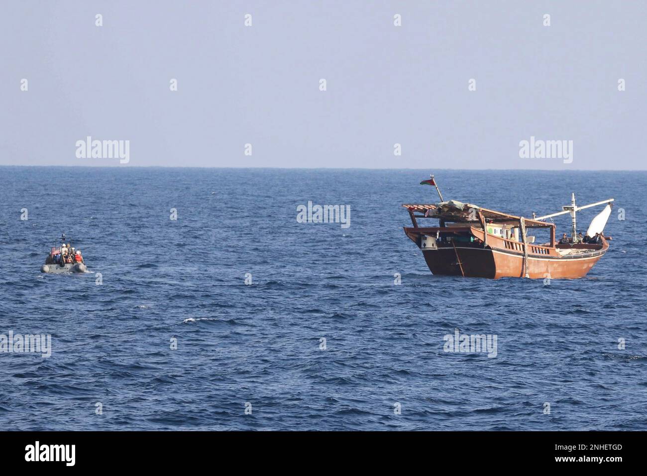 In this photo release by U.S. Navy, a boarding team from patrol coastal ...
