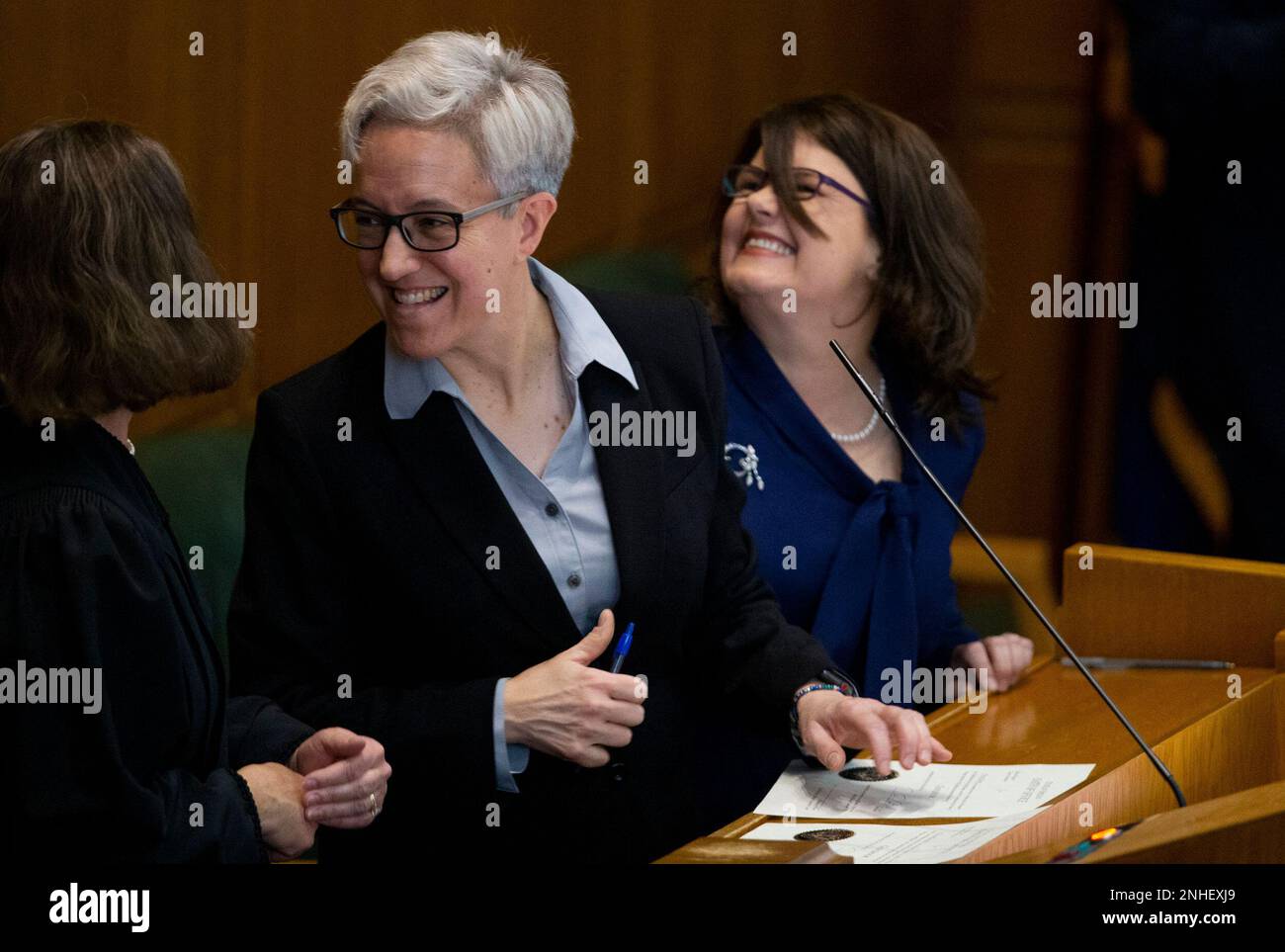 Tina Kotek, center, is accompanied by her wife Aimee Wilson, right, as ...
