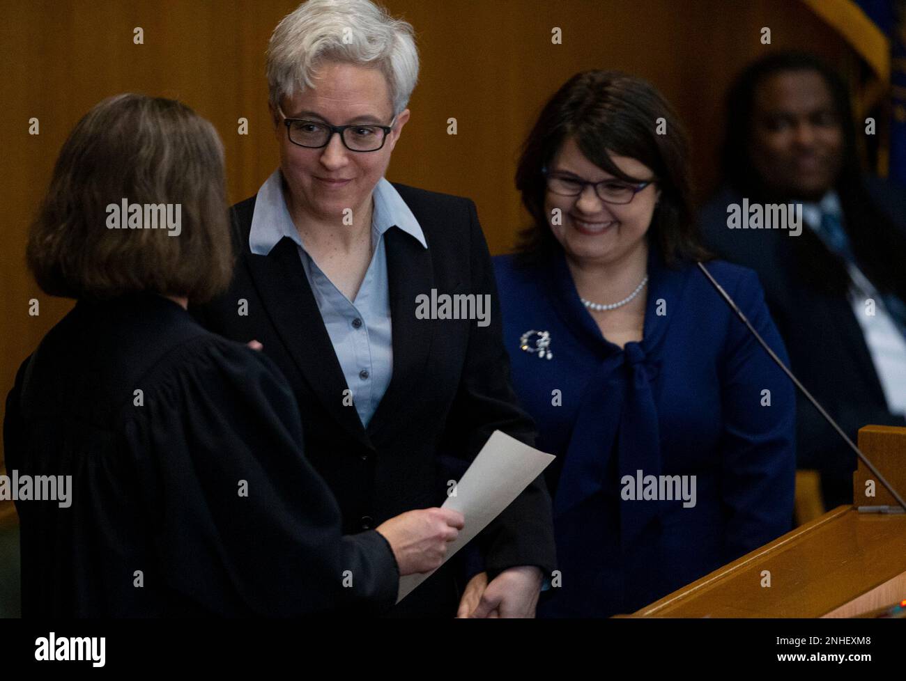 Tina Kotek, center, was accompanied by her wife Aimee Wilson, right, as ...
