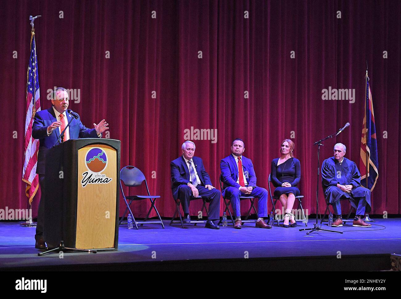 Re-elected Yuma Mayor Douglas Nicholls (left) addresses those attending ...