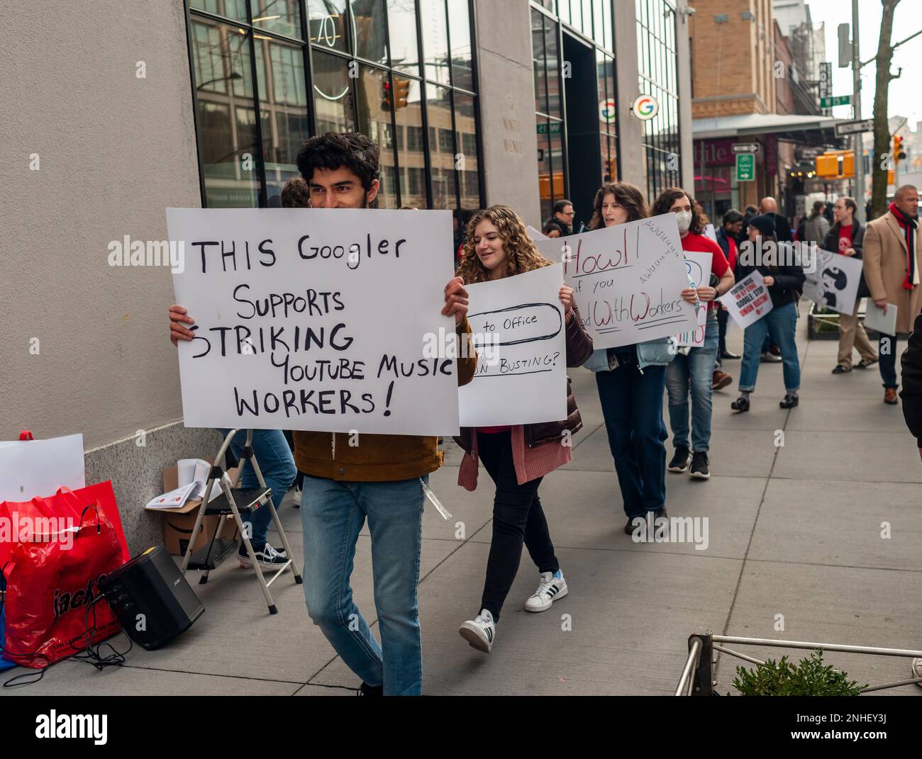YouTube workers and supporters rally outside of the Google building in ...