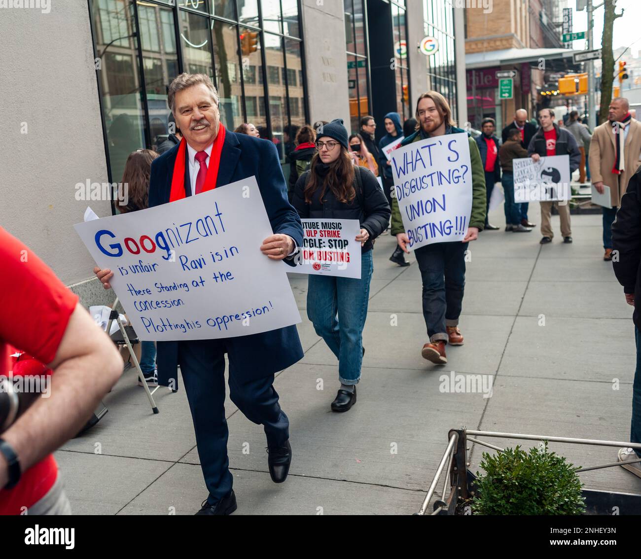 YouTube workers and supporters rally outside of the Google building in ...
