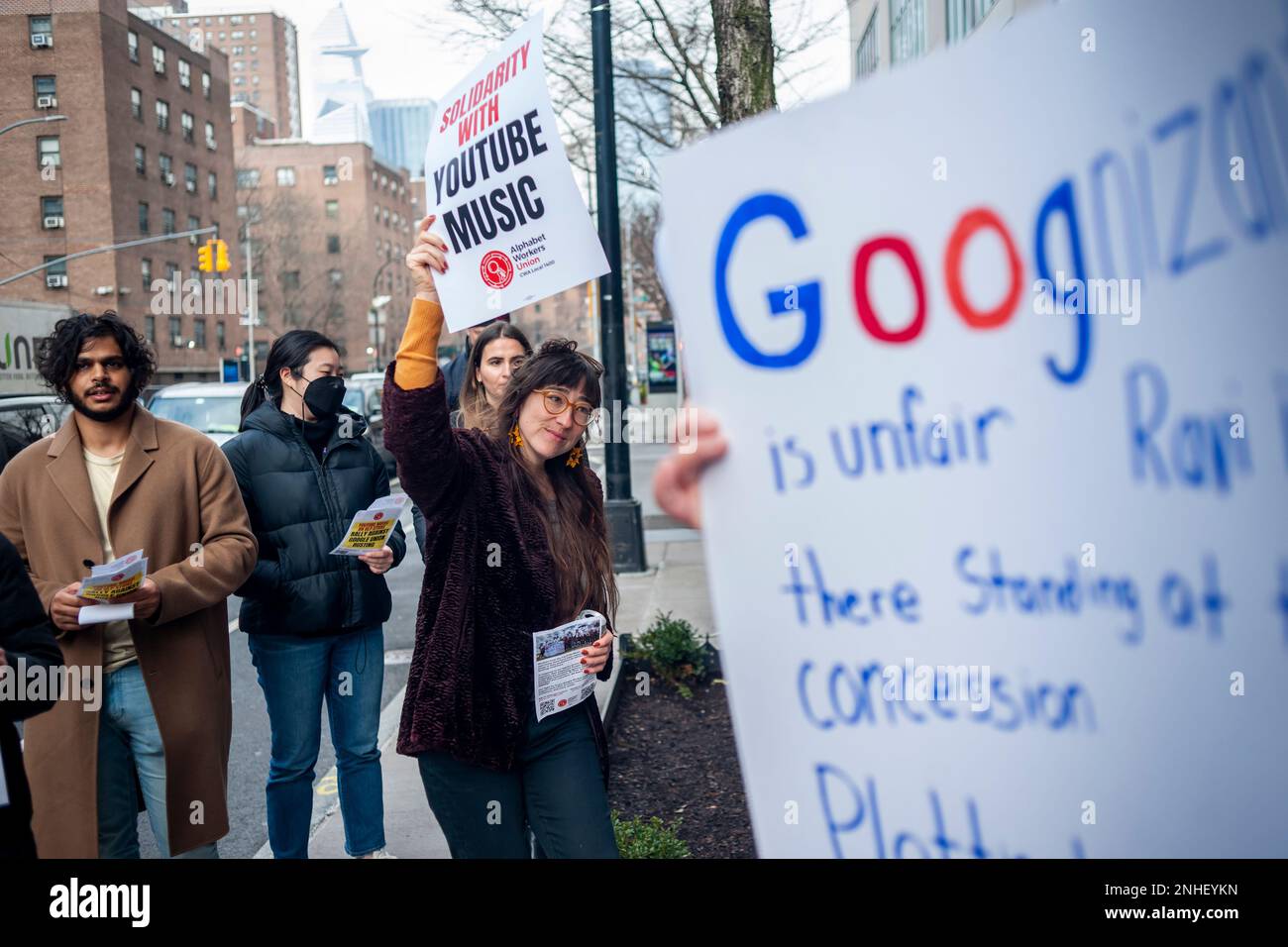 YouTube workers and supporters rally outside of the Google building in ...