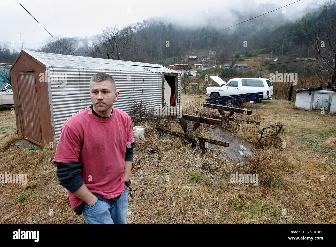 blake2 030 mac.jpg Fog rolls over the tops of hills that surround the ...