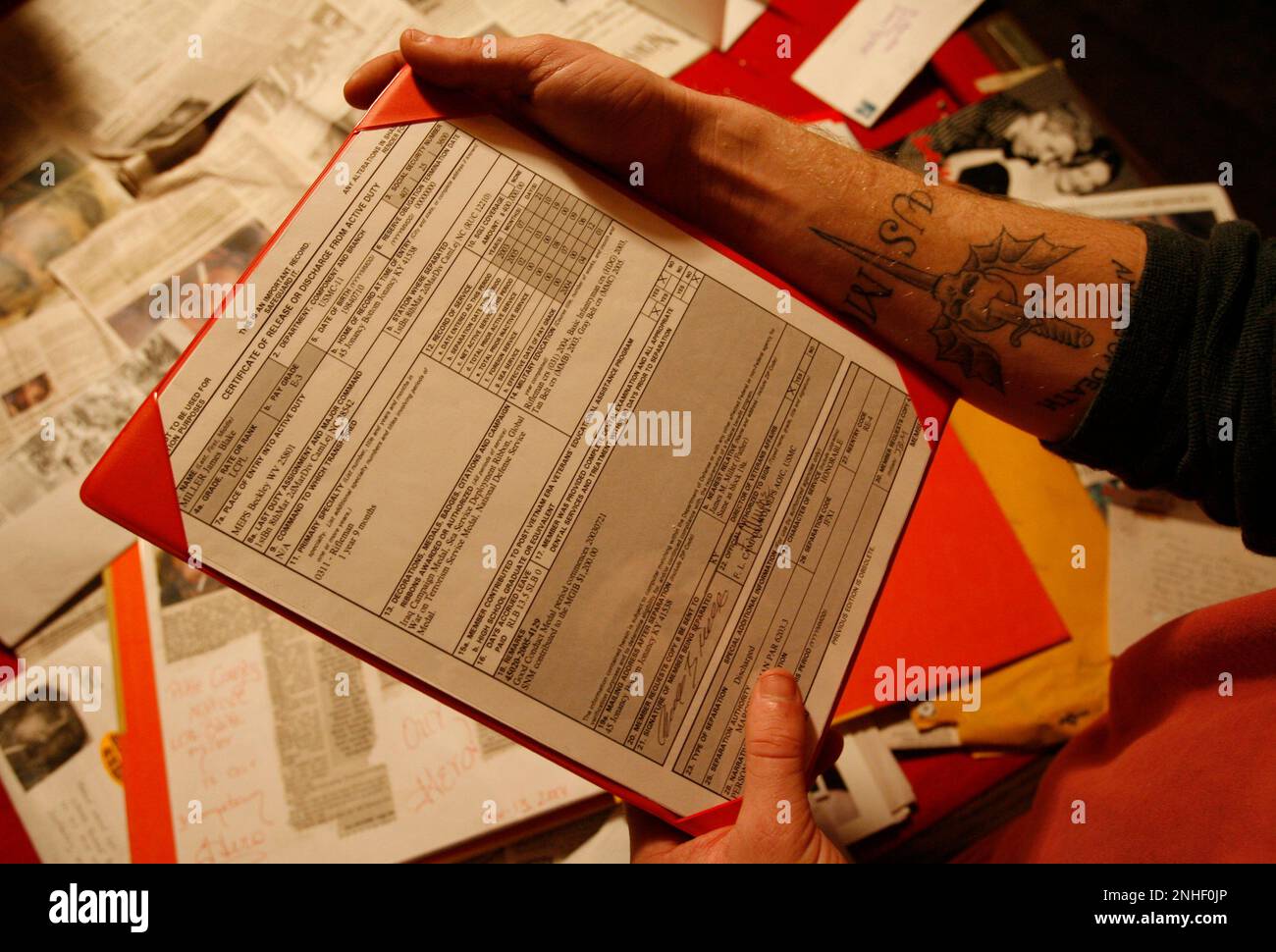 blake2 076 mac.jpg Blake holds his discharge order. Lance Corporal ...