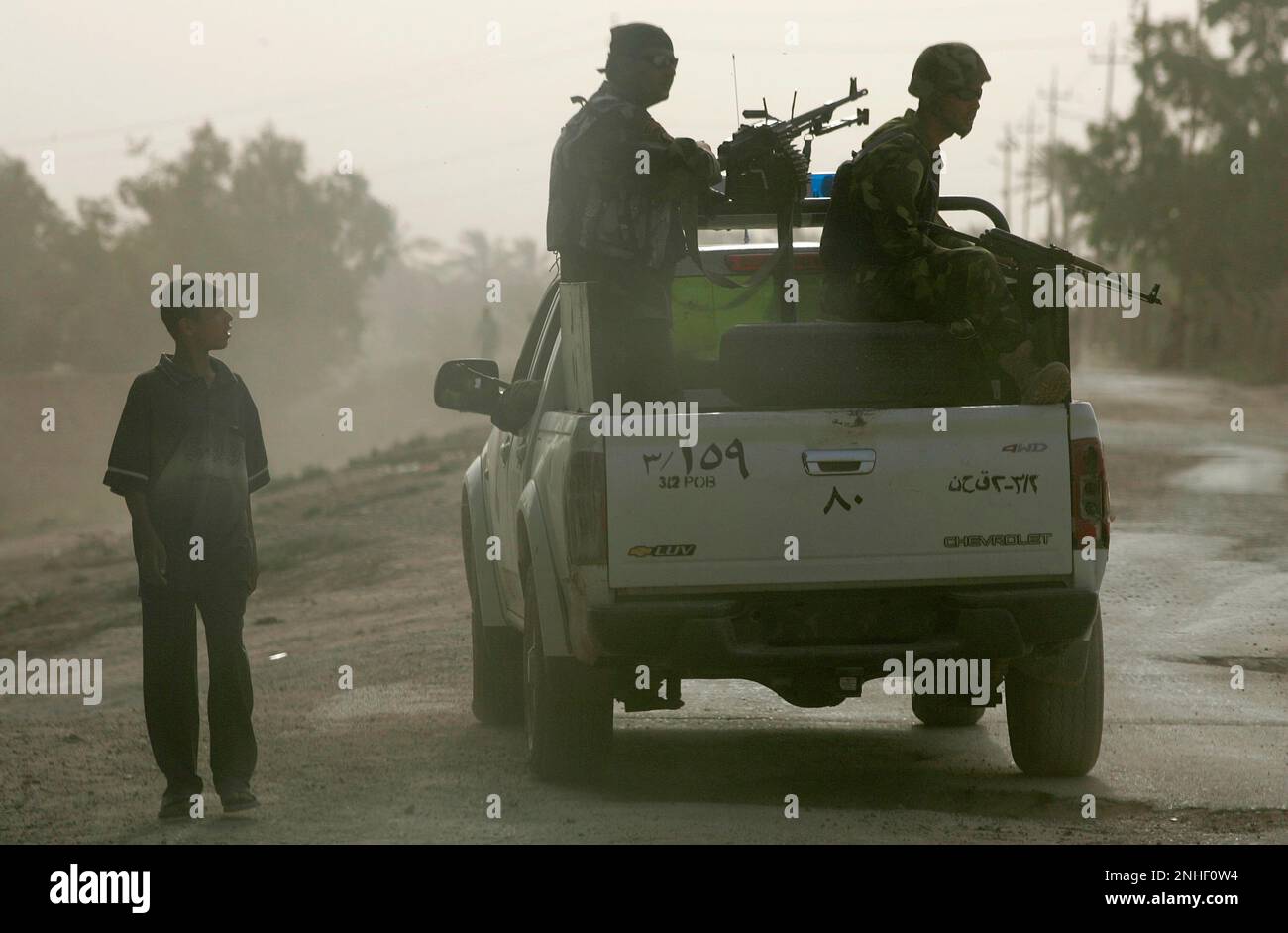 iraq24 042 mac.jpg Members of the Iraqi National Force patrol the ...