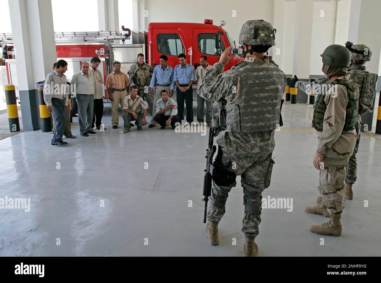 iraq23 055 mac.jpg Capt. Tom Deierlein takes a photo of the new Bunuq ...
