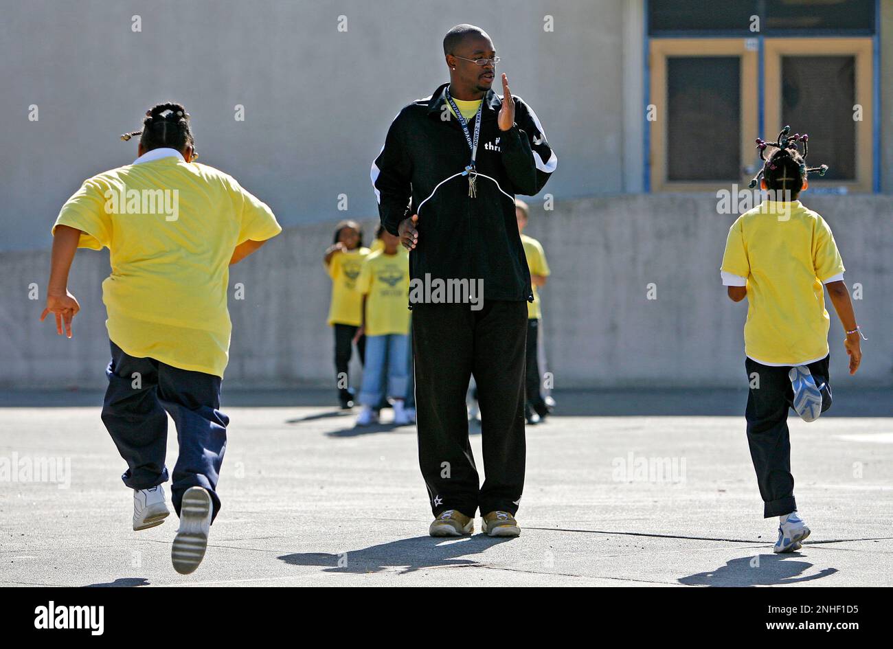 reaching back 071 mac.jpg Savannah Gable, n10 (left) and Desiree Gamble ...