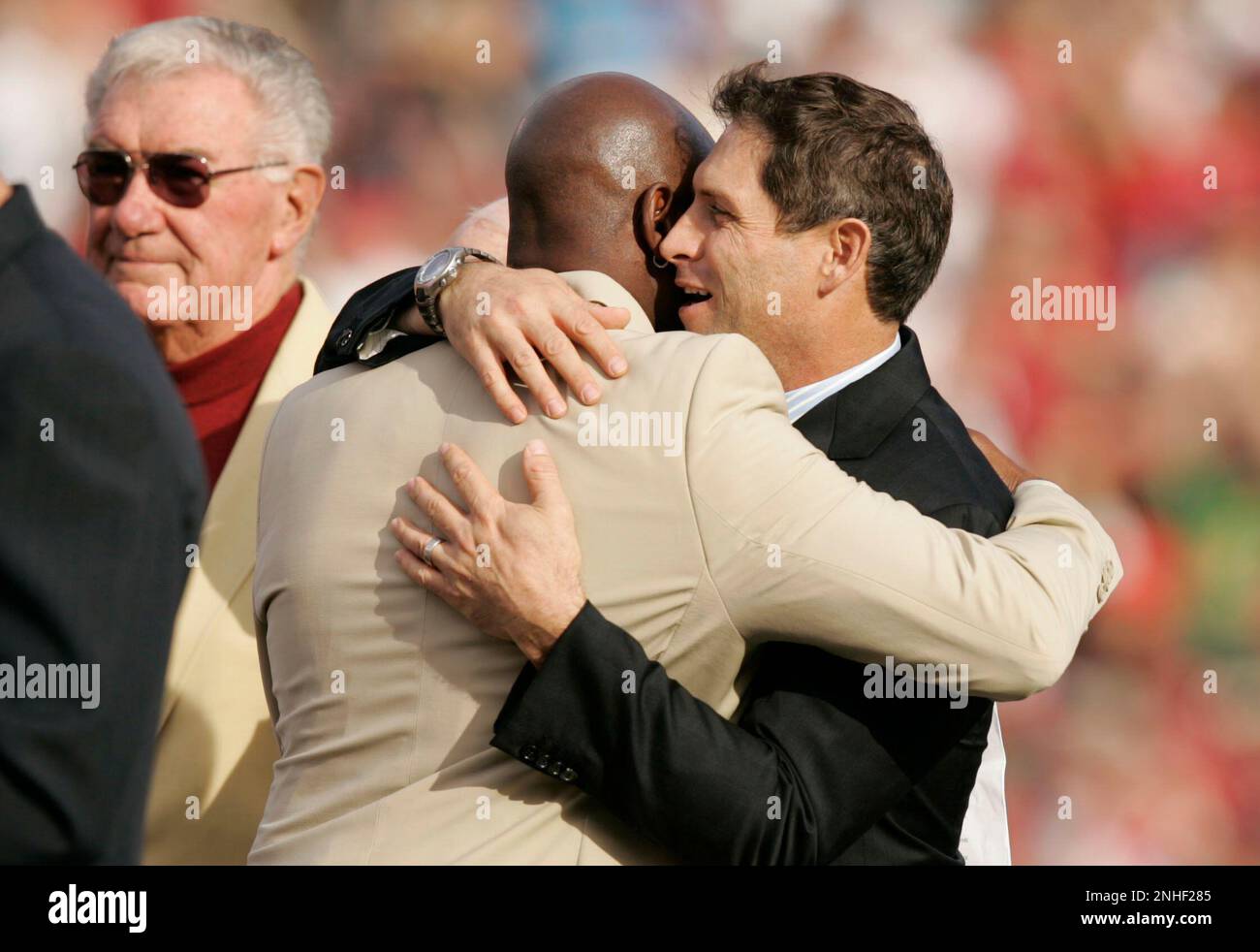 Jerry Rice gets a hug from ex-teammate Steve Young. (Michael Macor/San ...