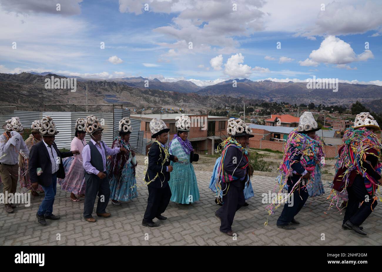 Aymara couples, wearing hats made of sweet bread that represent hope ...