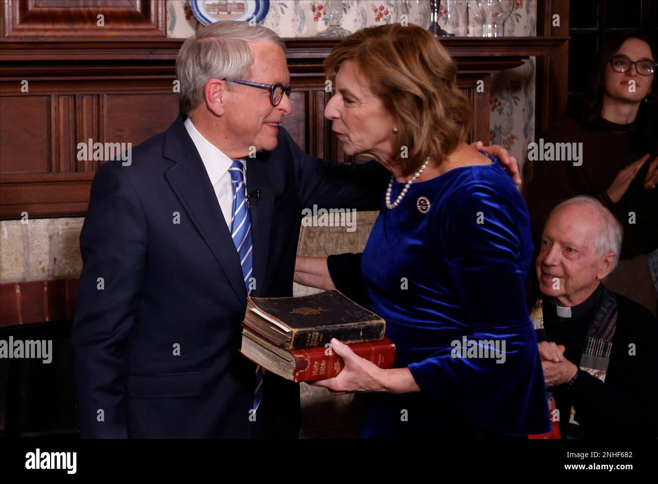 Ohio Governor Mike DeWine hugs his wife Fran after taking the oath of ...